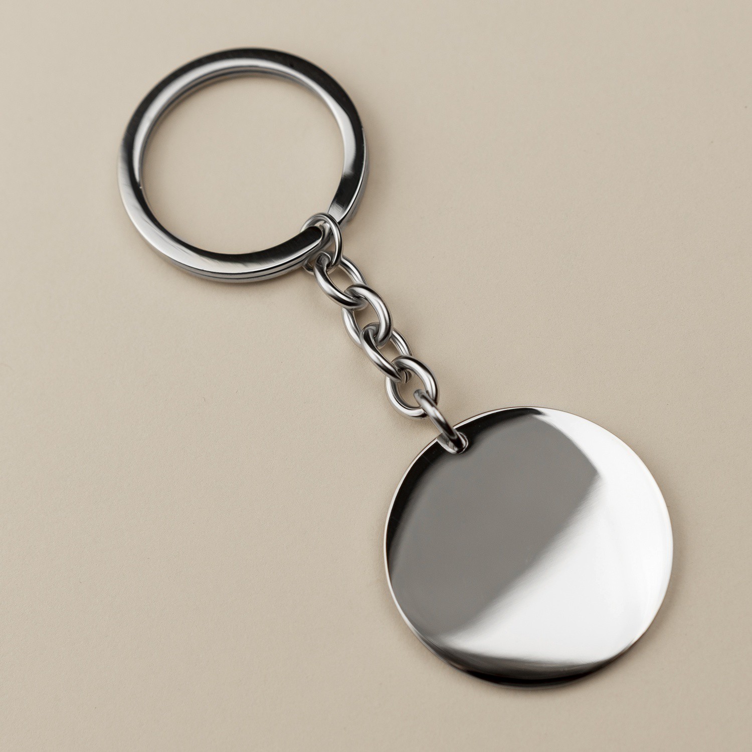 portachiavi-tondo-personalizzabile-in-acciaio-